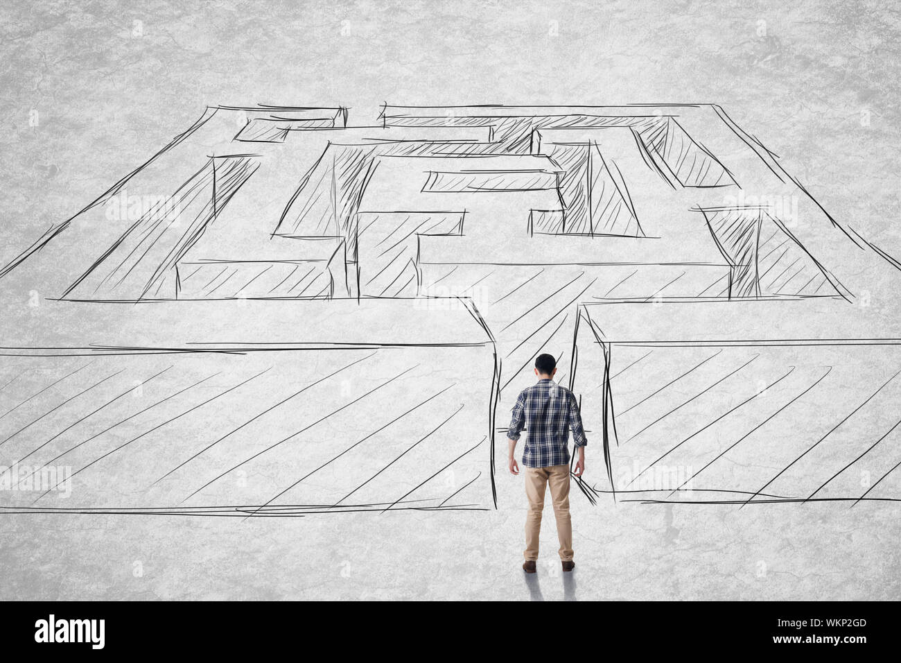 Asian man stand in front of a maze. Photo compilation with hand drawn ...