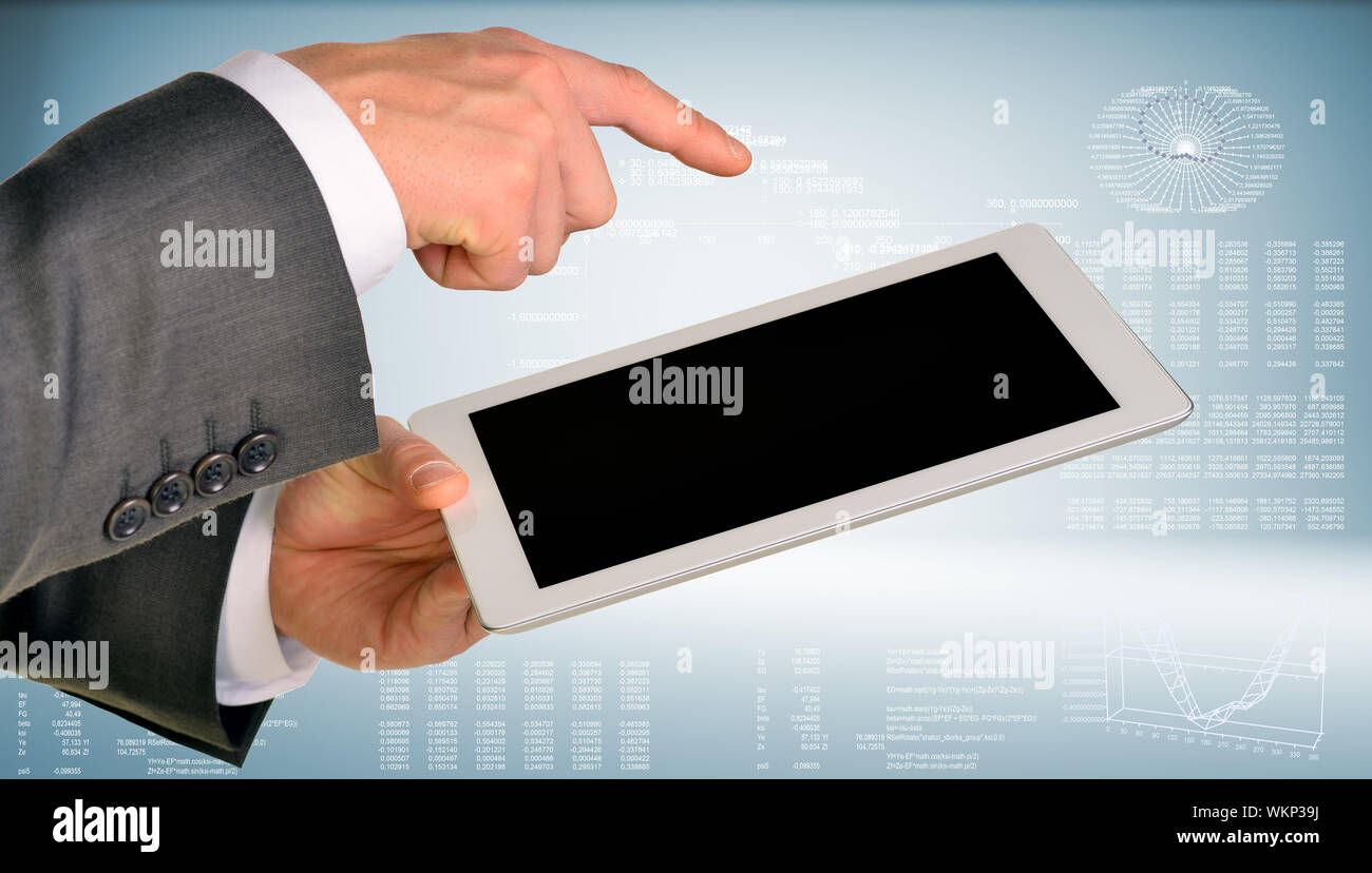 Businessman hand using tablet computer. Hi-tech background with graphs ...