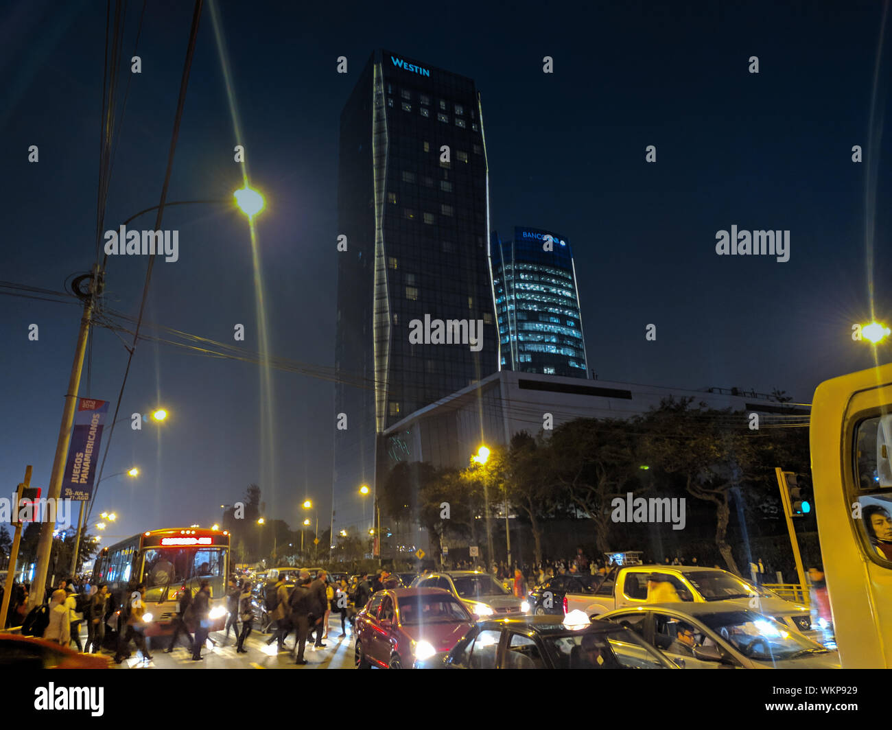 San isidro district in Lima Peru with a lot of traffic by night on the ...