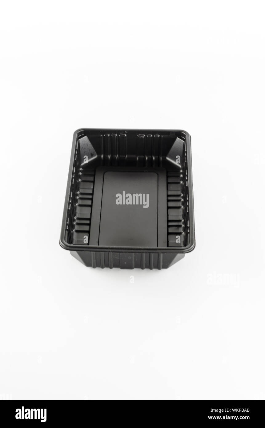 black plastic tray on a white background Stock Photo - Alamy