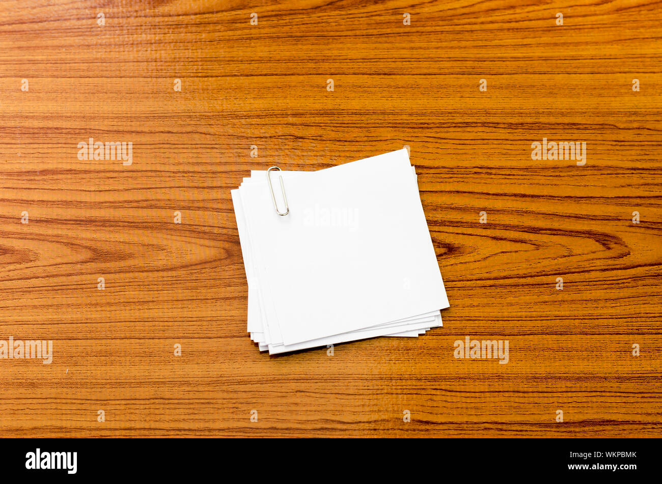 stack of paper with clip Stock Photo - Alamy