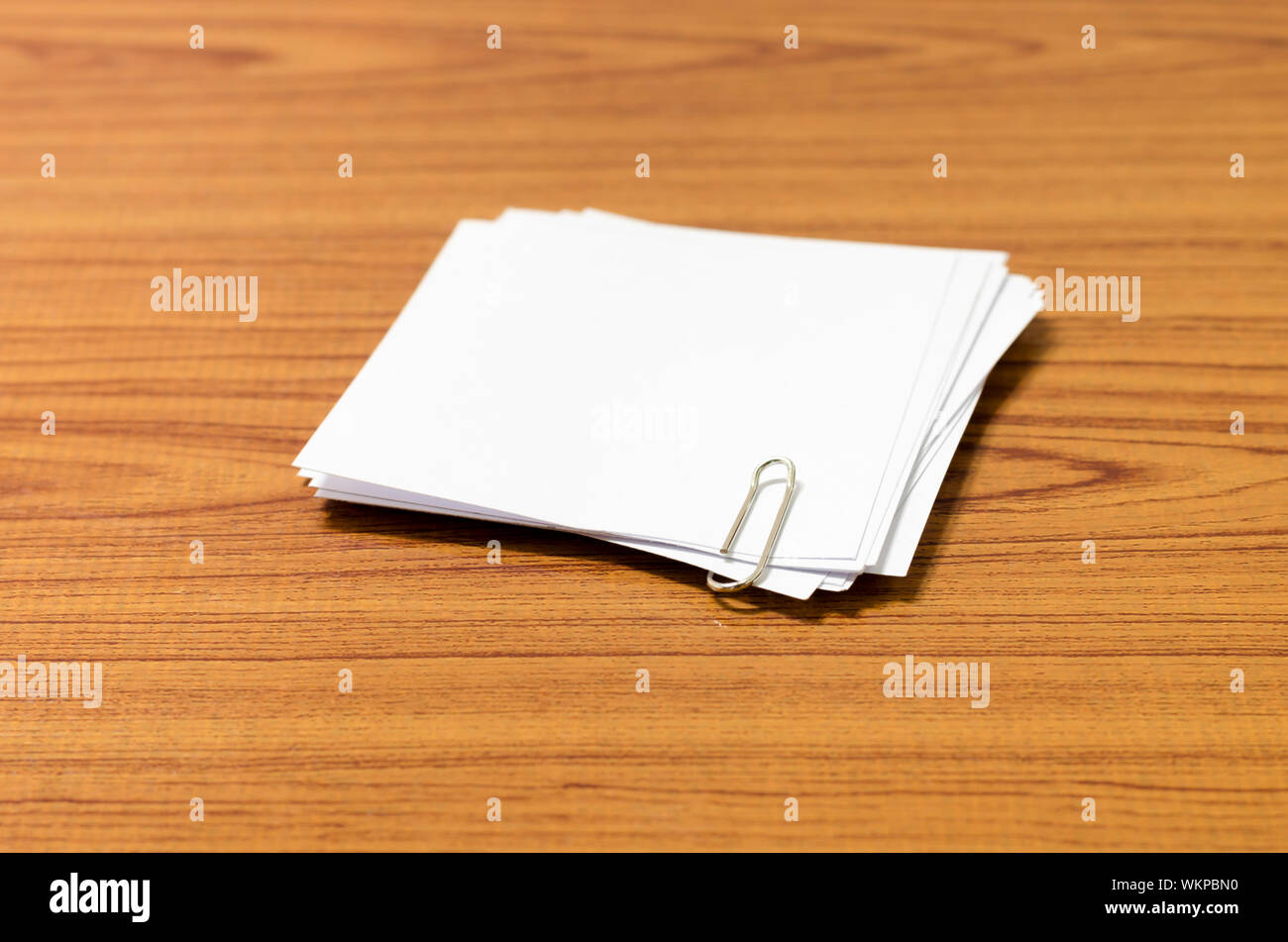 stack of paper with clip Stock Photo - Alamy