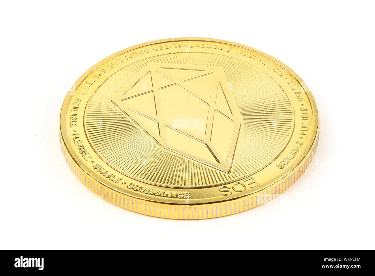 Back side of the crypto currency golden EOS isolated on white ...