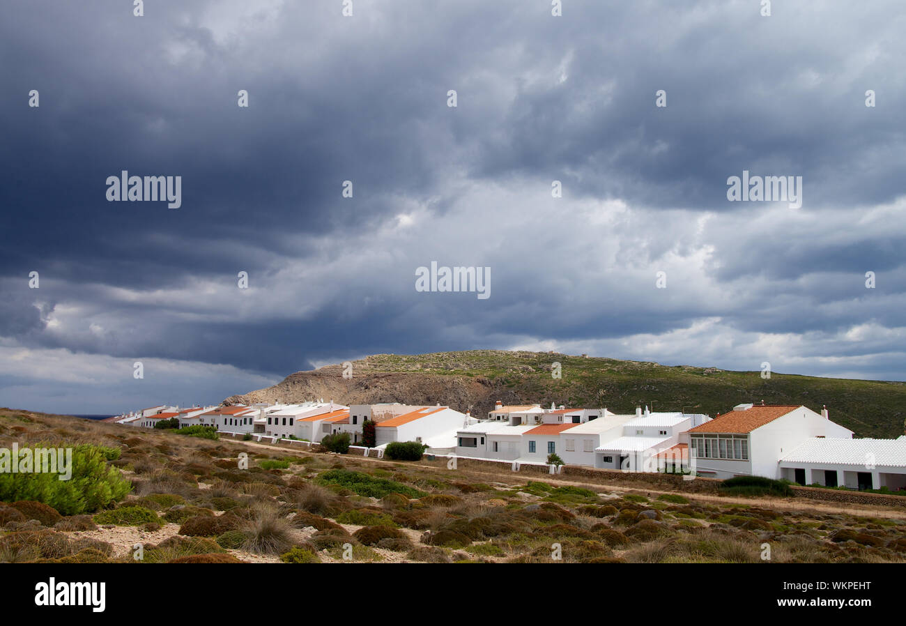 Classic Small Menorca Urbanization between Hills under Cloudy Skies ...