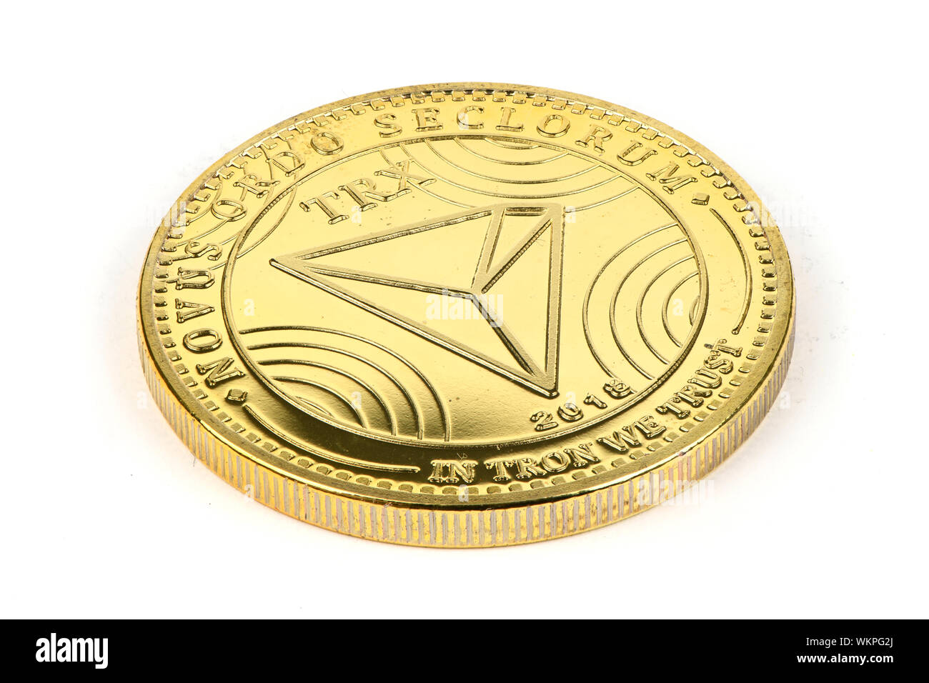 Back side of the crypto currency golden tron isolated on white ...