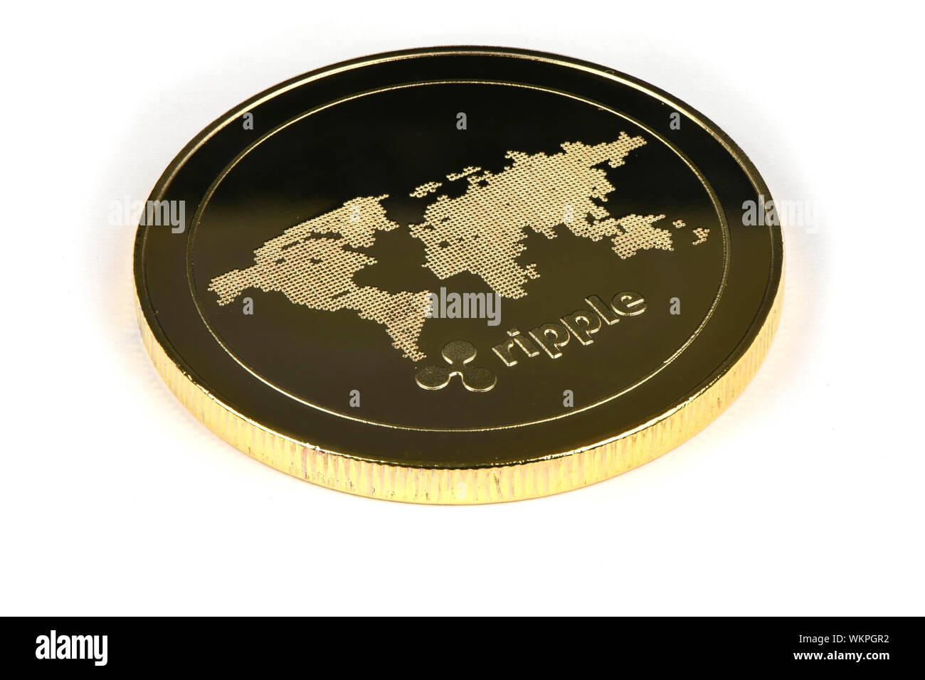 Face of the crypto currency golden ripple isolated on white background ...
