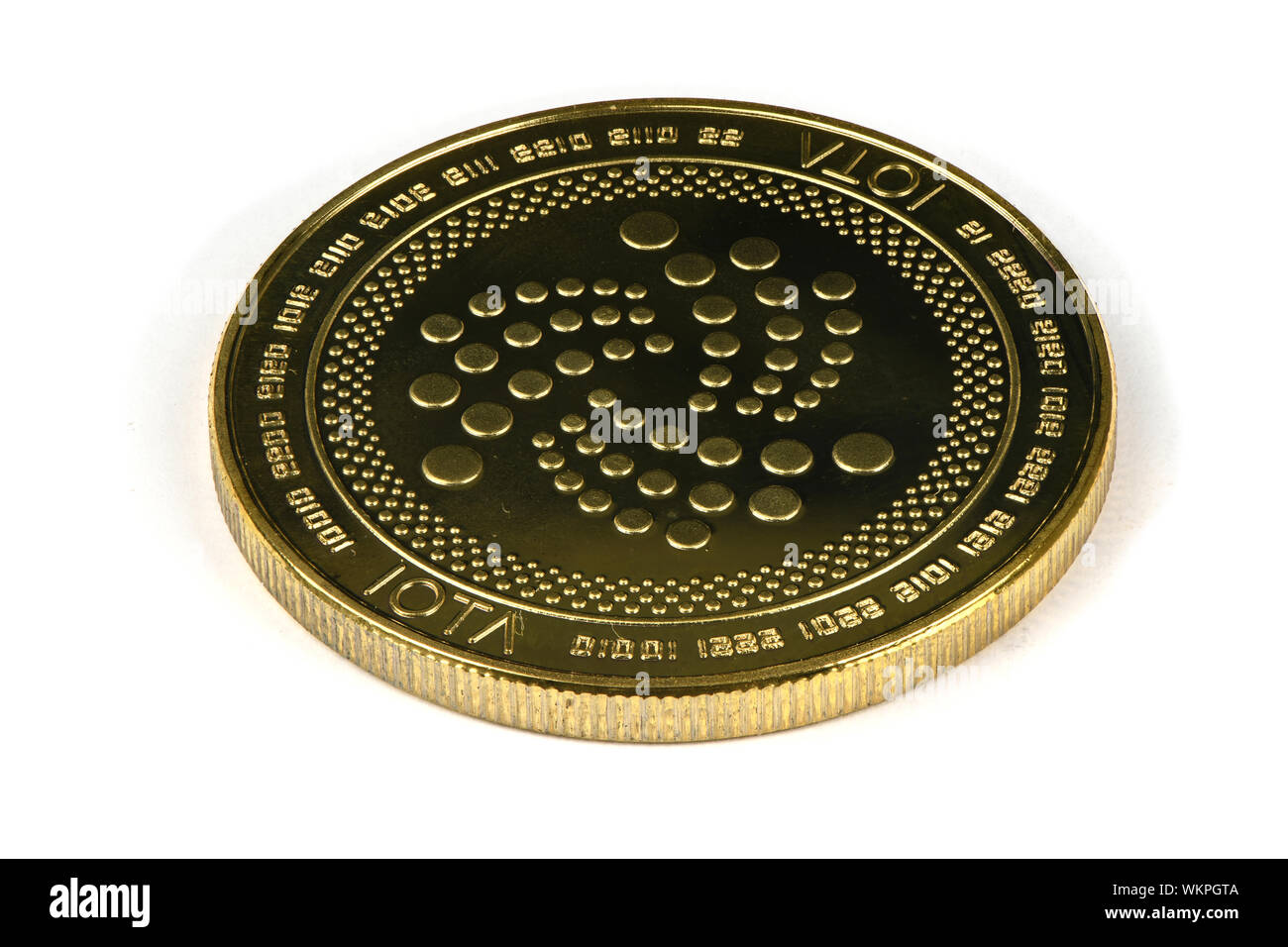 Face of the crypto currency golden iota isolated on white background ...