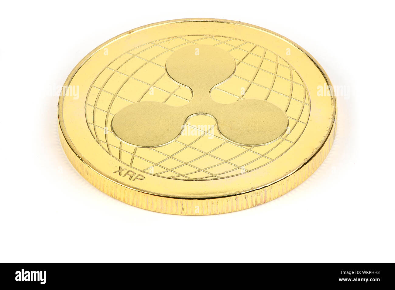 Back side of the crypto currency golden ripple isolated on white ...