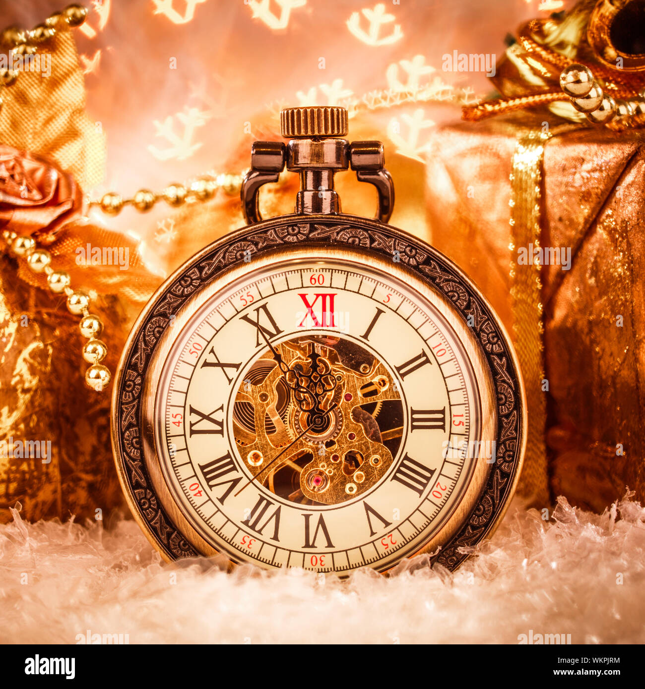 Christmas pocket watch still life Stock Photo - Alamy