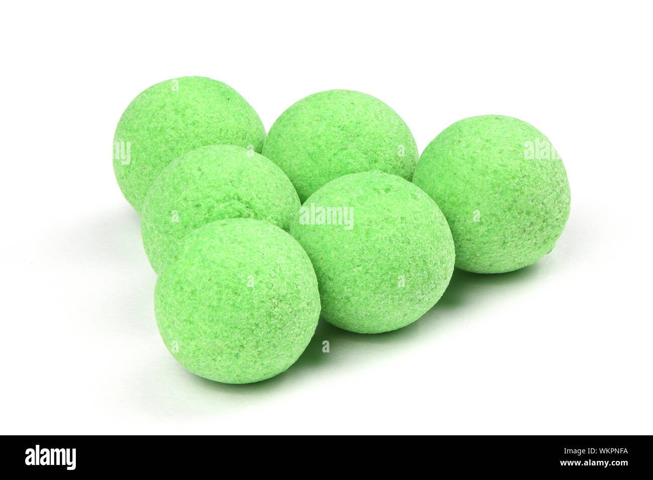 Close up view of green boilies, fishing baits for carp isolated on ...