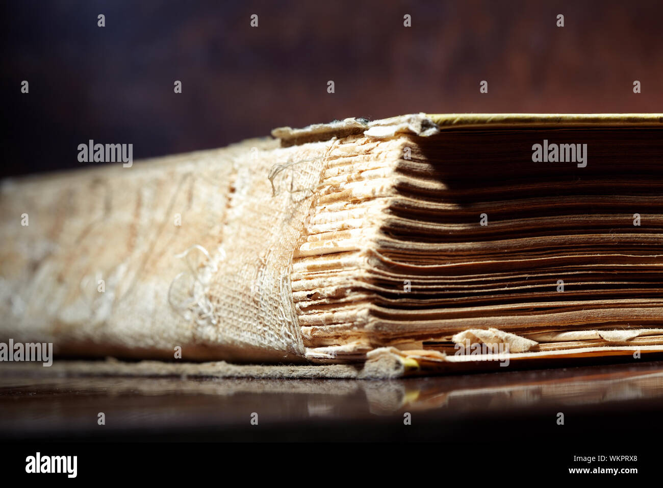 Damaged cover of the old book. Close-up photo with shallow depth of ...