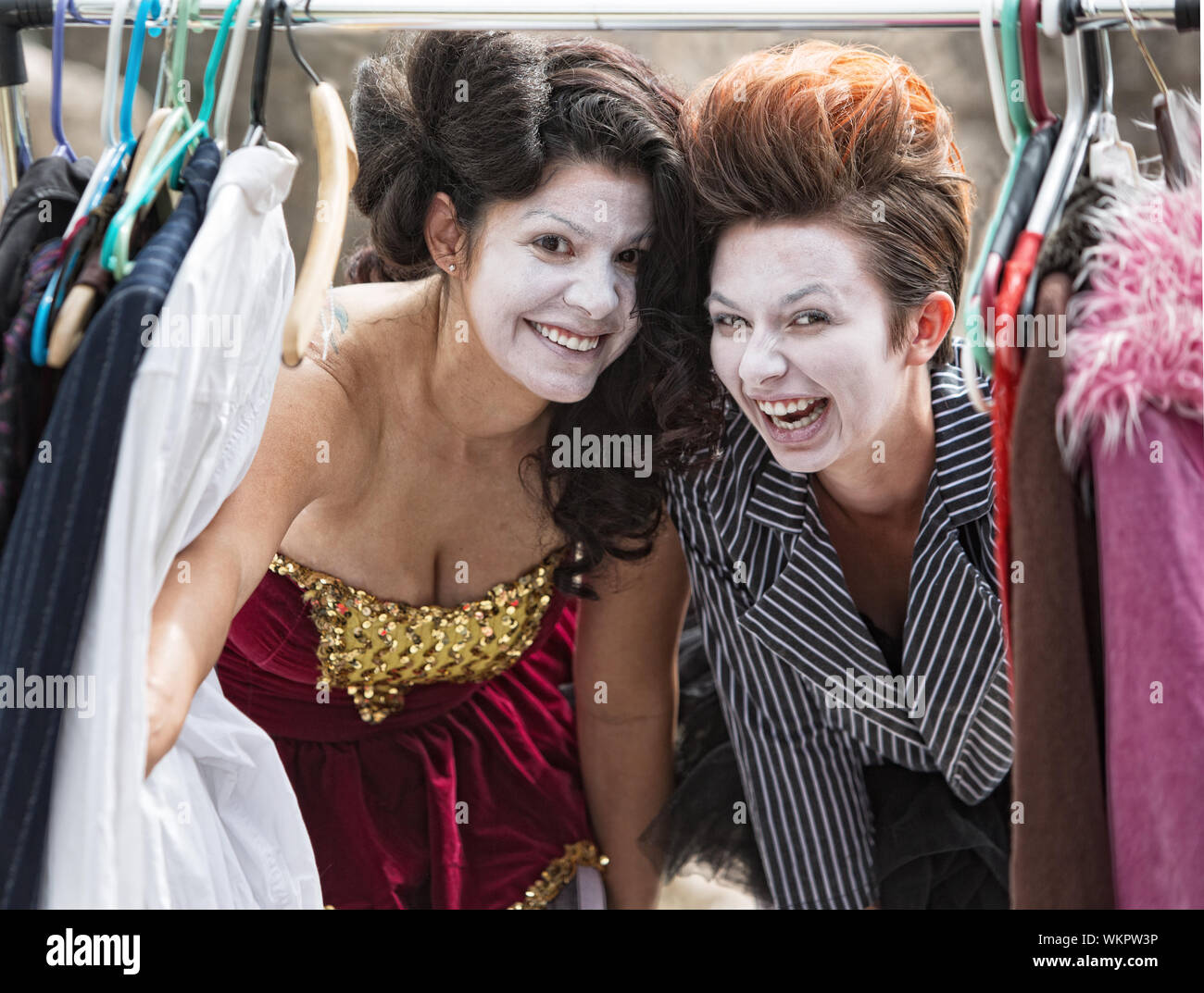 Comedia Del Arte actors laughing at clothing rack Stock Photo - Alamy