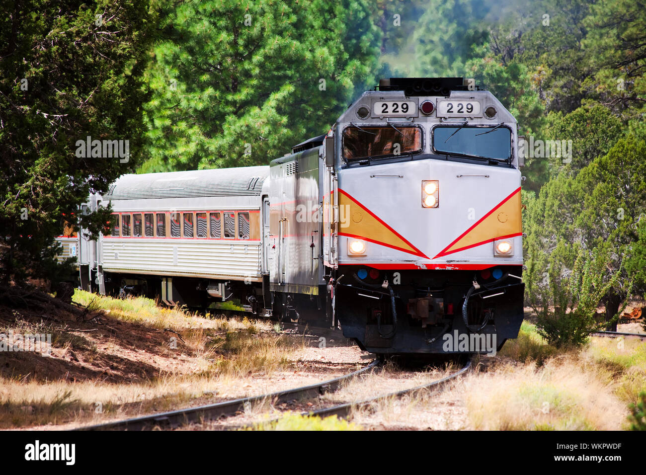 Vintage tourist train engine on curved track Stock Photo - Alamy