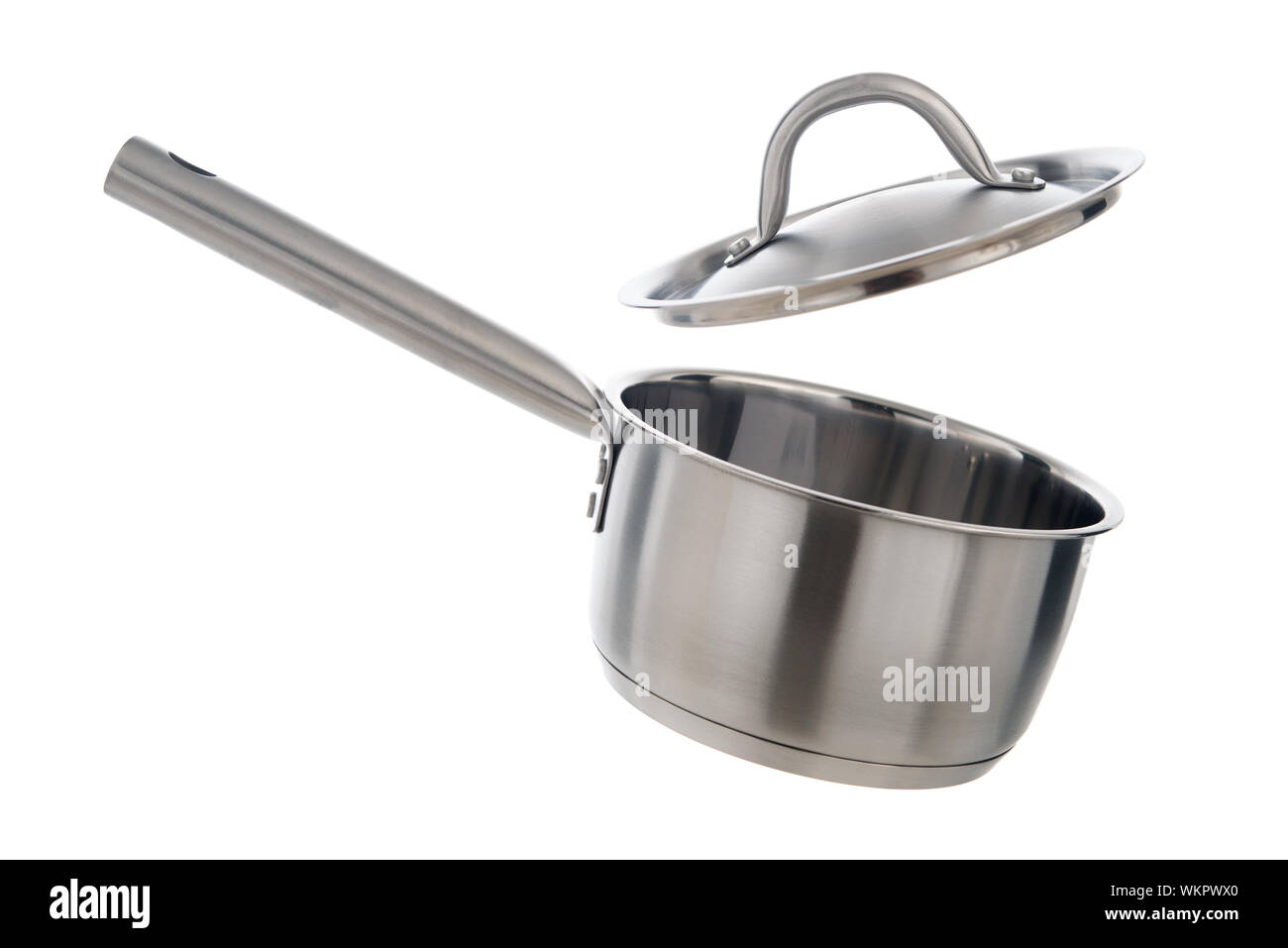 Stainless steel cooking pot with lid opened, isolated on white ...