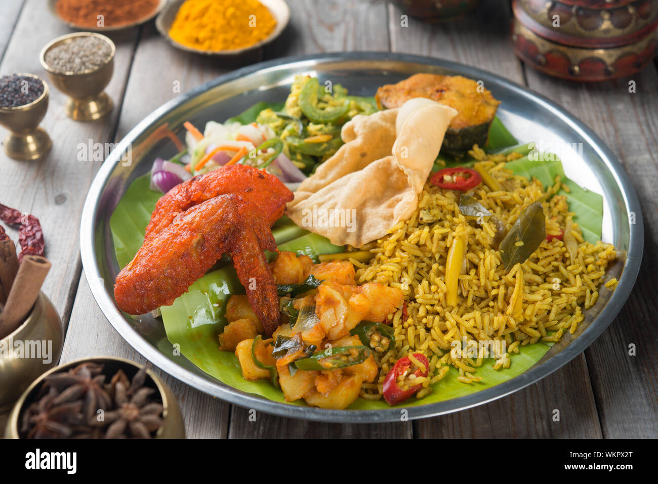 Traditional Indian biryani rice on wooden dining table Stock Photo - Alamy