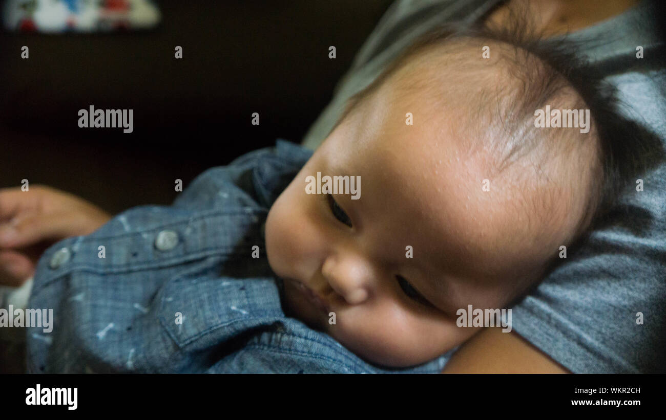 Baby in the arm hi-res stock photography and images - Alamy