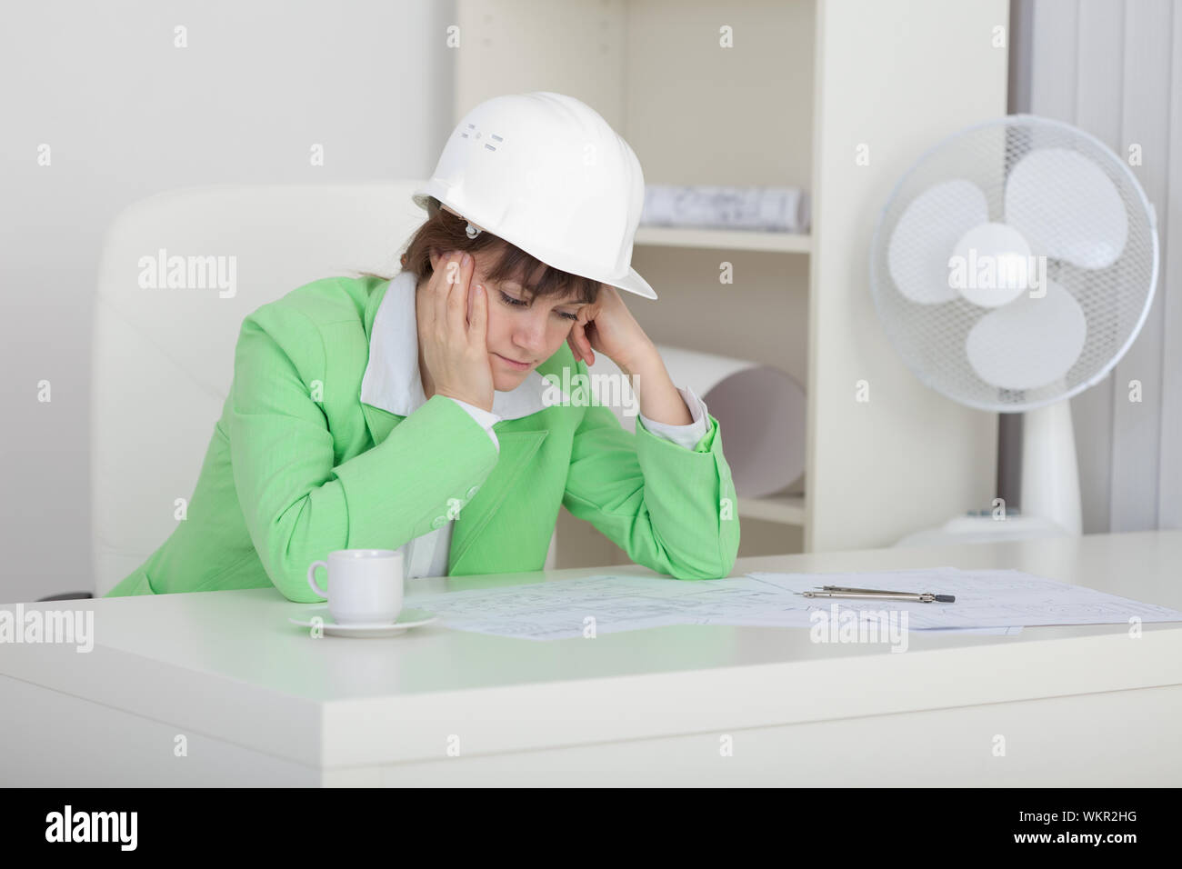 Girl boss sits on chair hi-res stock photography and images - Alamy