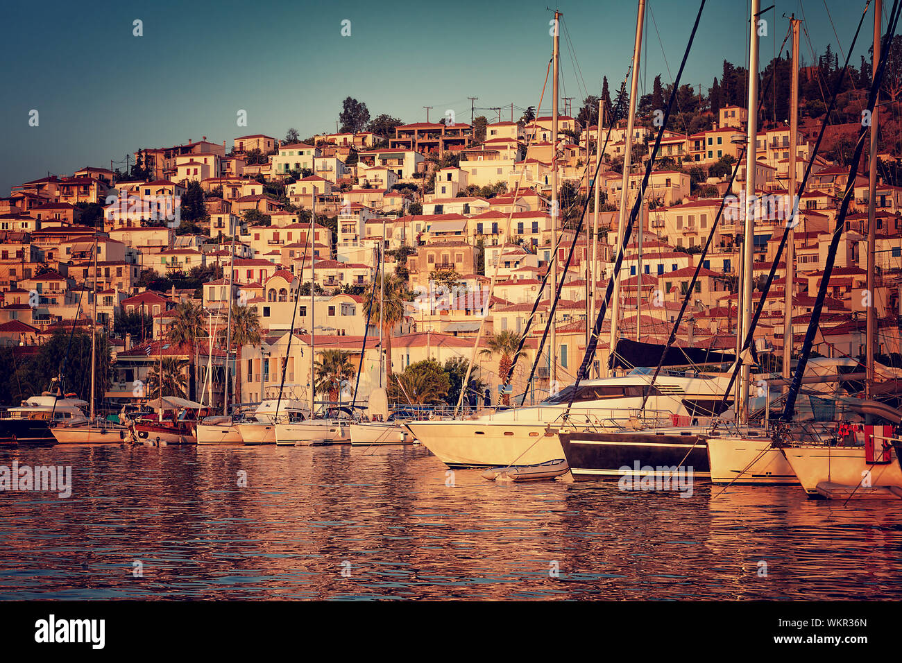 Beautiful cityscape in sunset light, luxury sailboat harbour in little ...