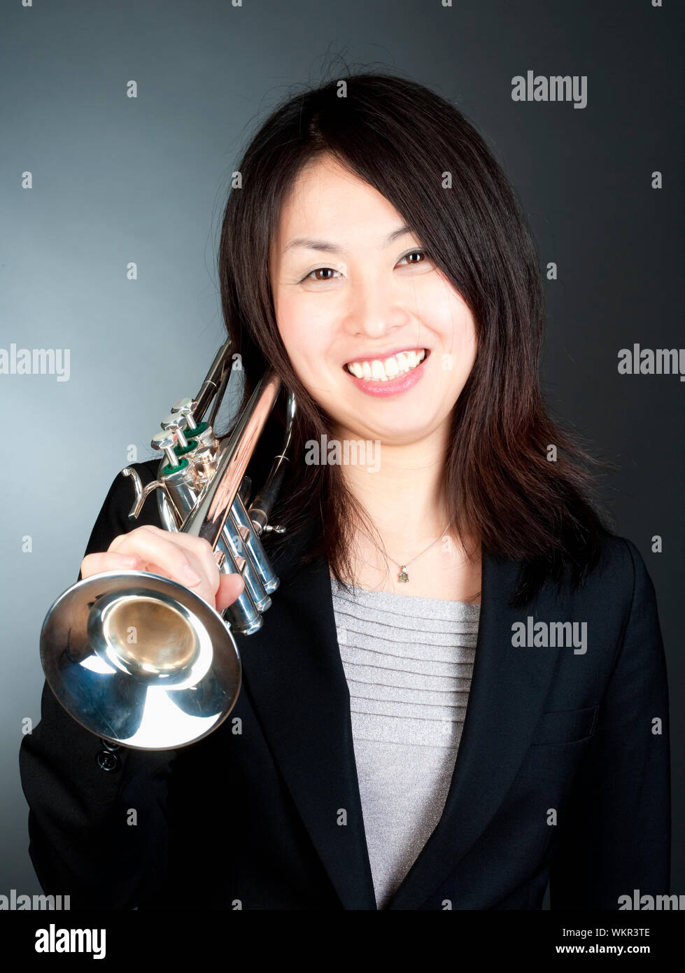 Portrait of a Female Trumpet Player - Isolated on White Stock Photo - Alamy
