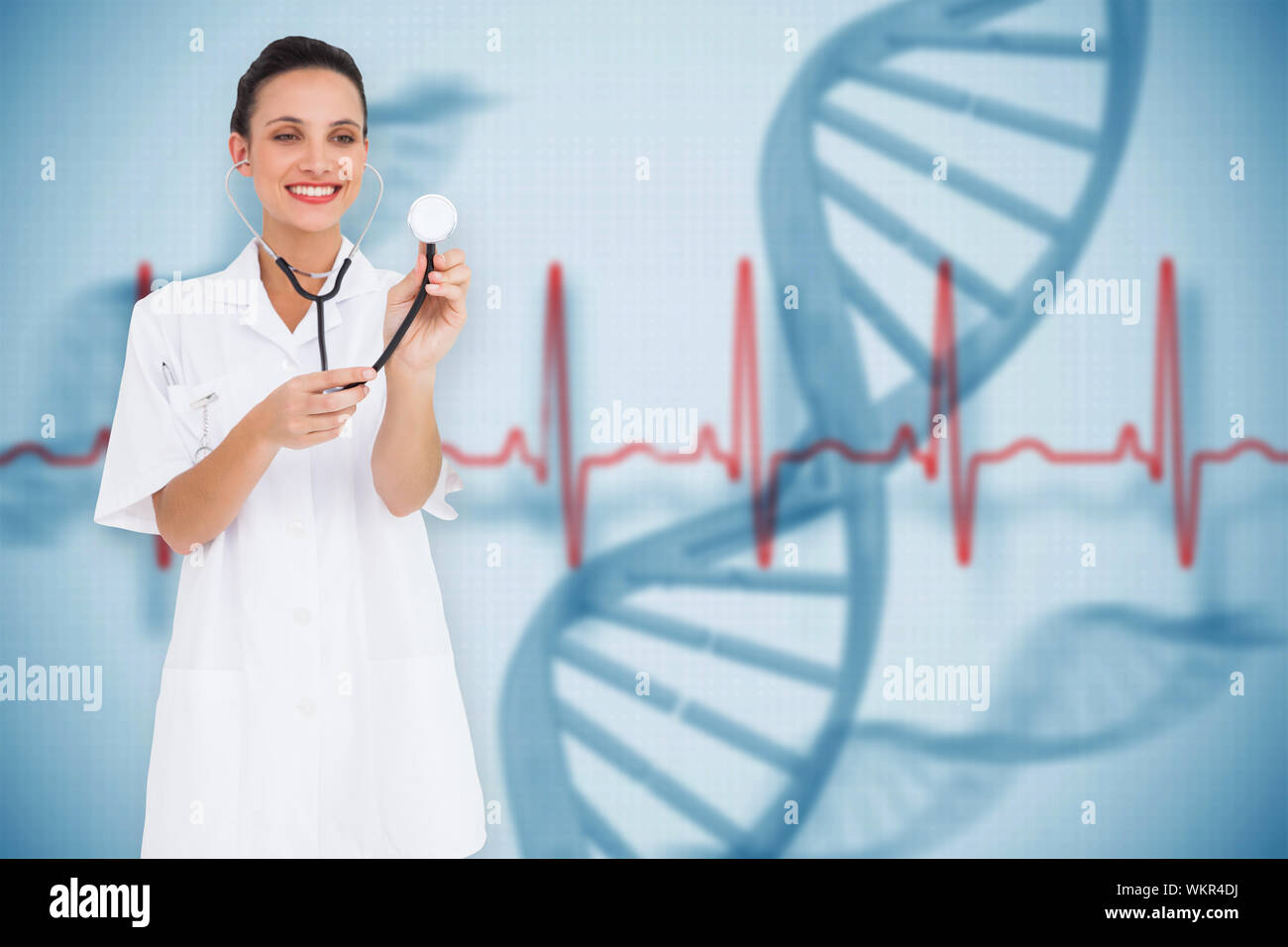 Pretty nurse listening with stethoscope against blue medical background ...