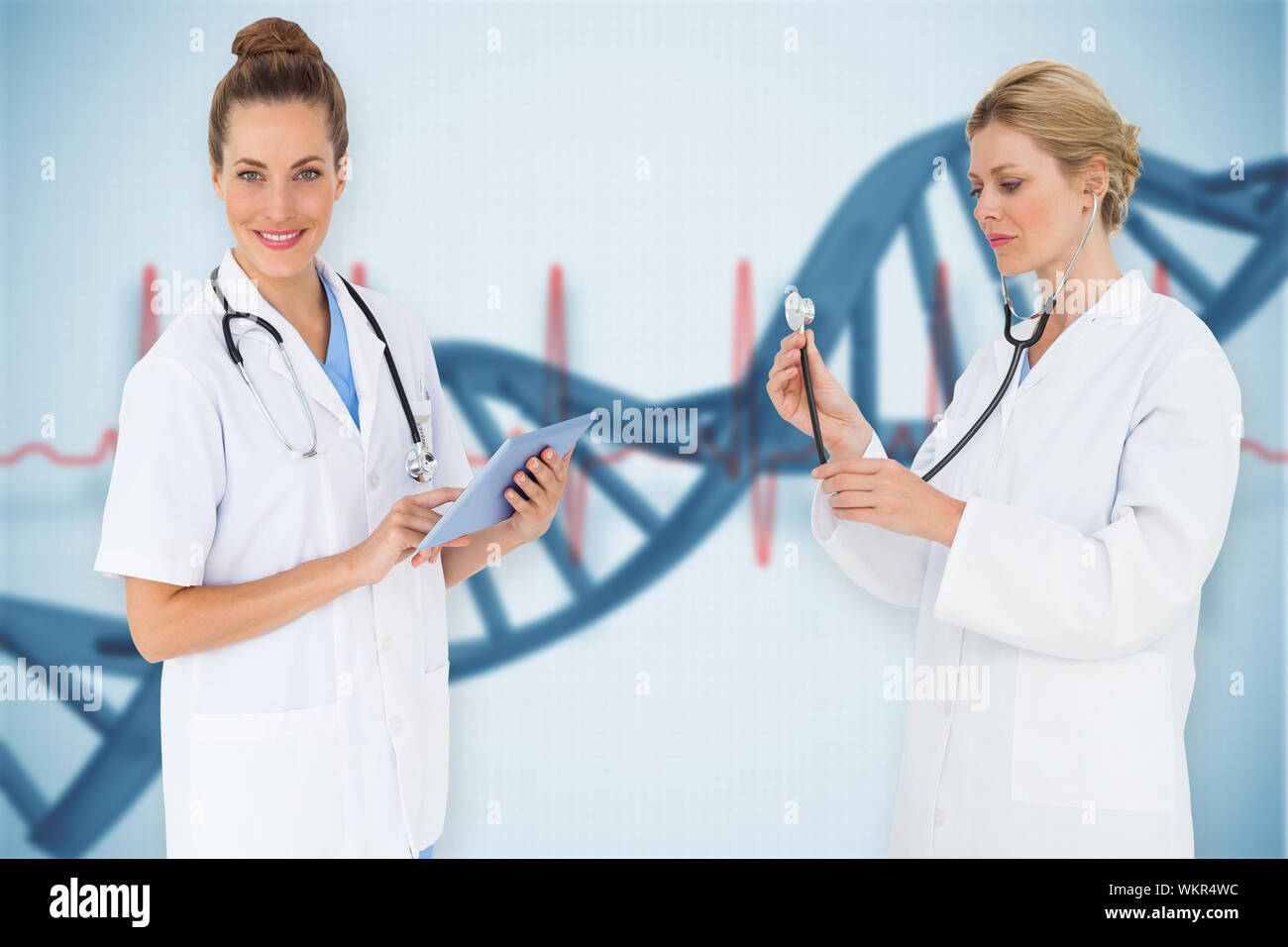 Composite image of female medical team against blue medical background ...