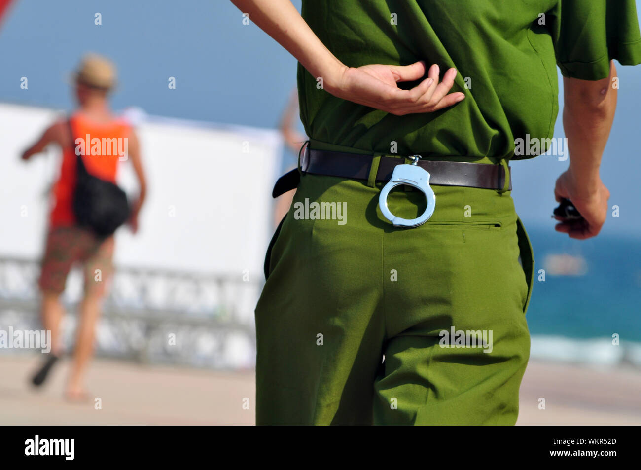Real police handcuffs hi-res stock photography and images - Alamy