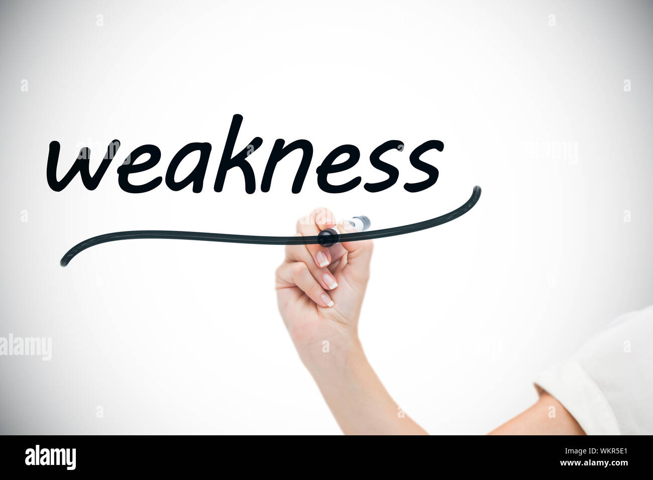 White character holding marker against stack of books Stock Photo - Alamy