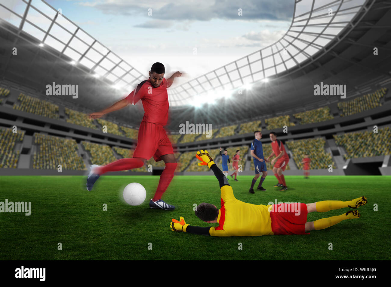 Composite image of football match in progress in football stadium Stock ...