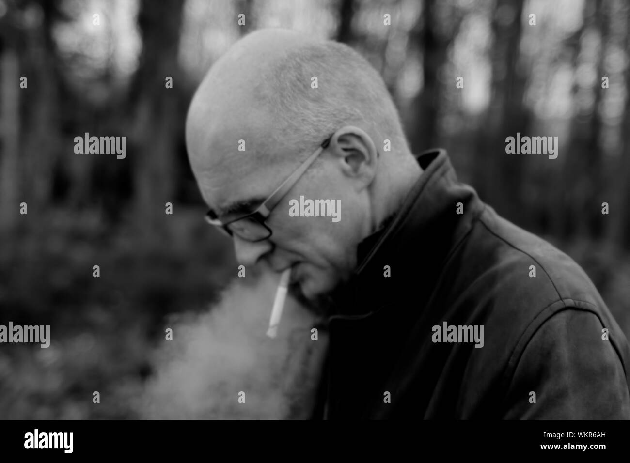 Smoking smoke side Black and White Stock Photos & Images - Alamy