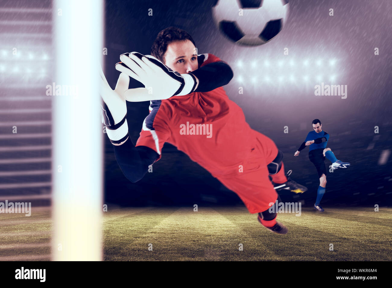 Goal keeper saving penalty hi-res stock photography and images - Alamy
