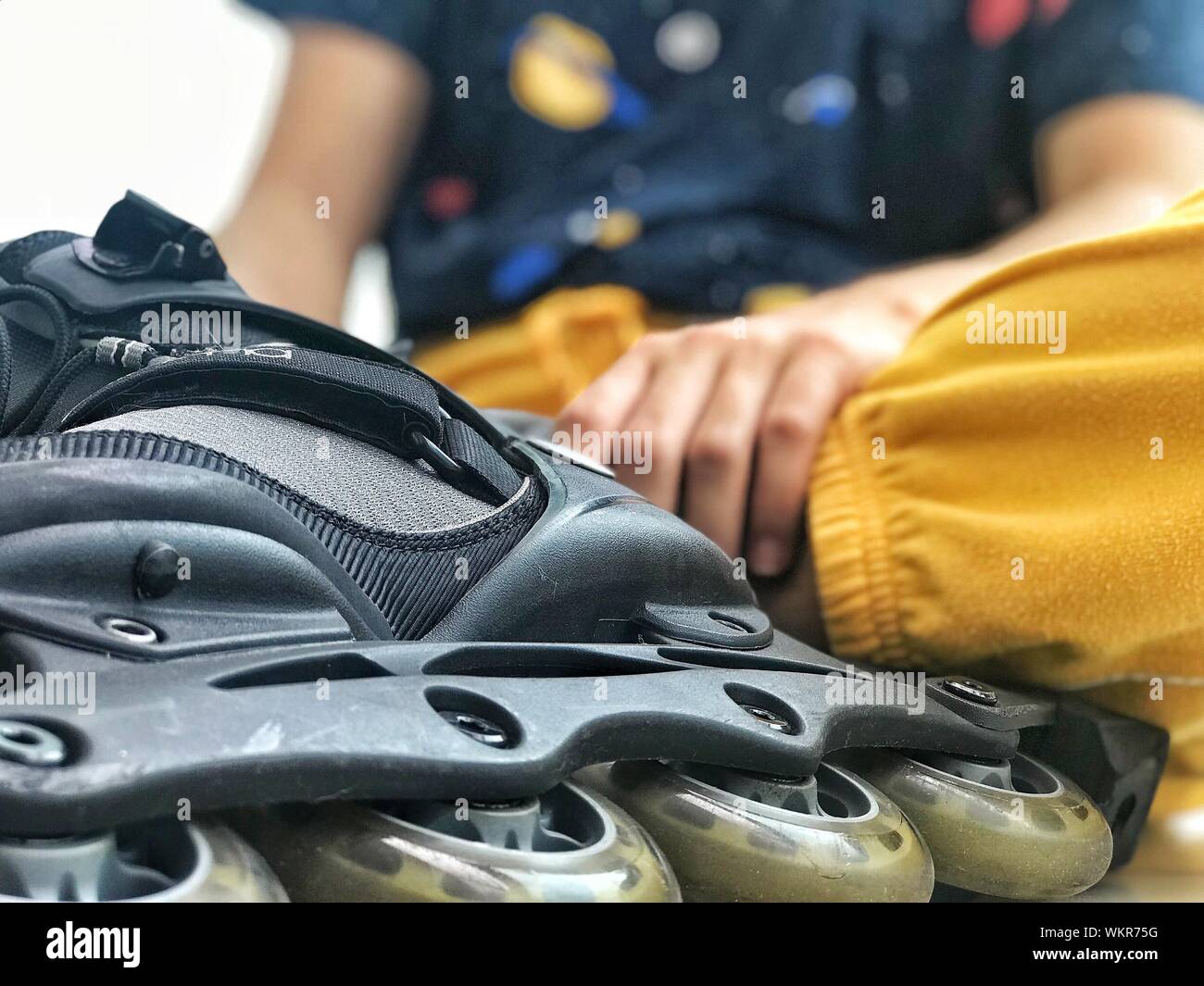 Boy inline skating outdoors hi-res stock photography and images - Alamy