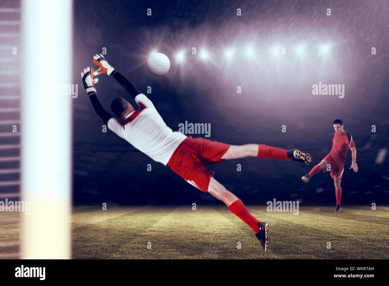 Goal keeper saving penalty hi-res stock photography and images - Alamy