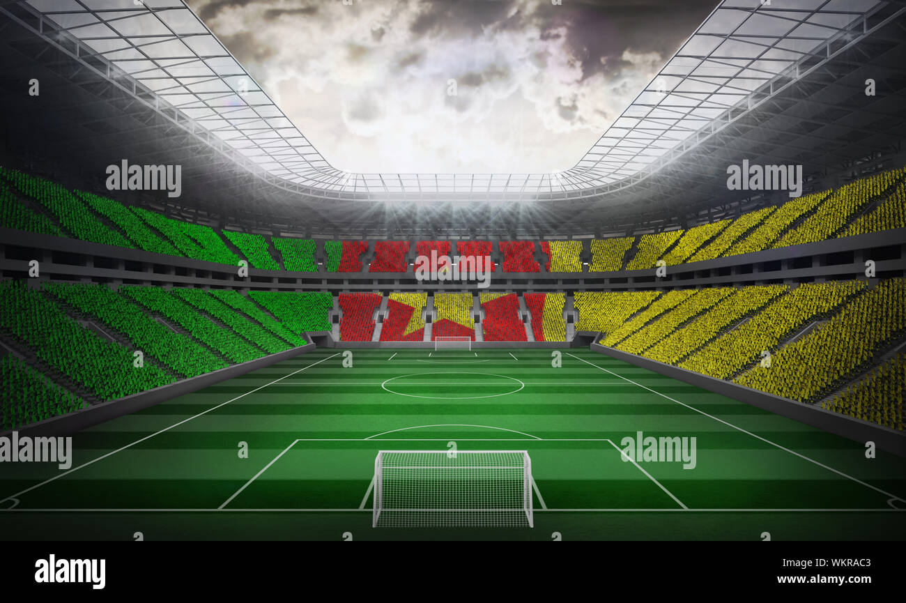 Digitally generated cameroon national flag against football stadium ...