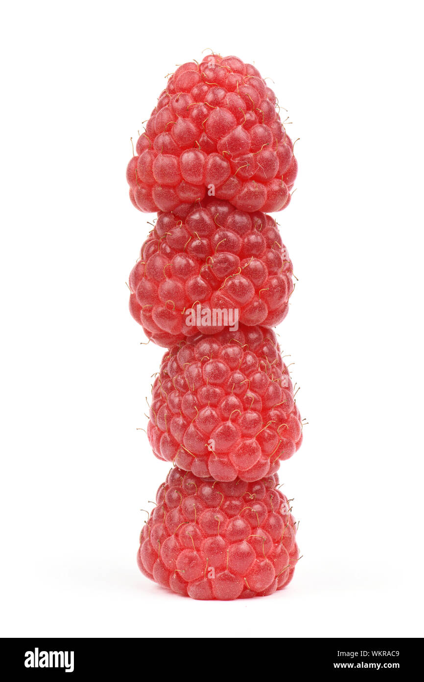 Four raspberries stacked on top of each other, isolated on white ...