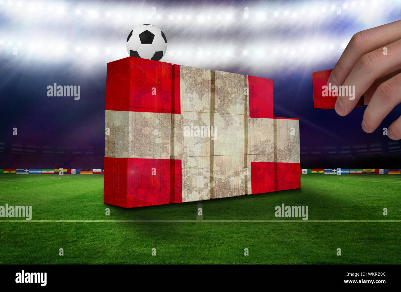 Hand building wall of switzerland flag in grunge effect Stock Photo - Alamy