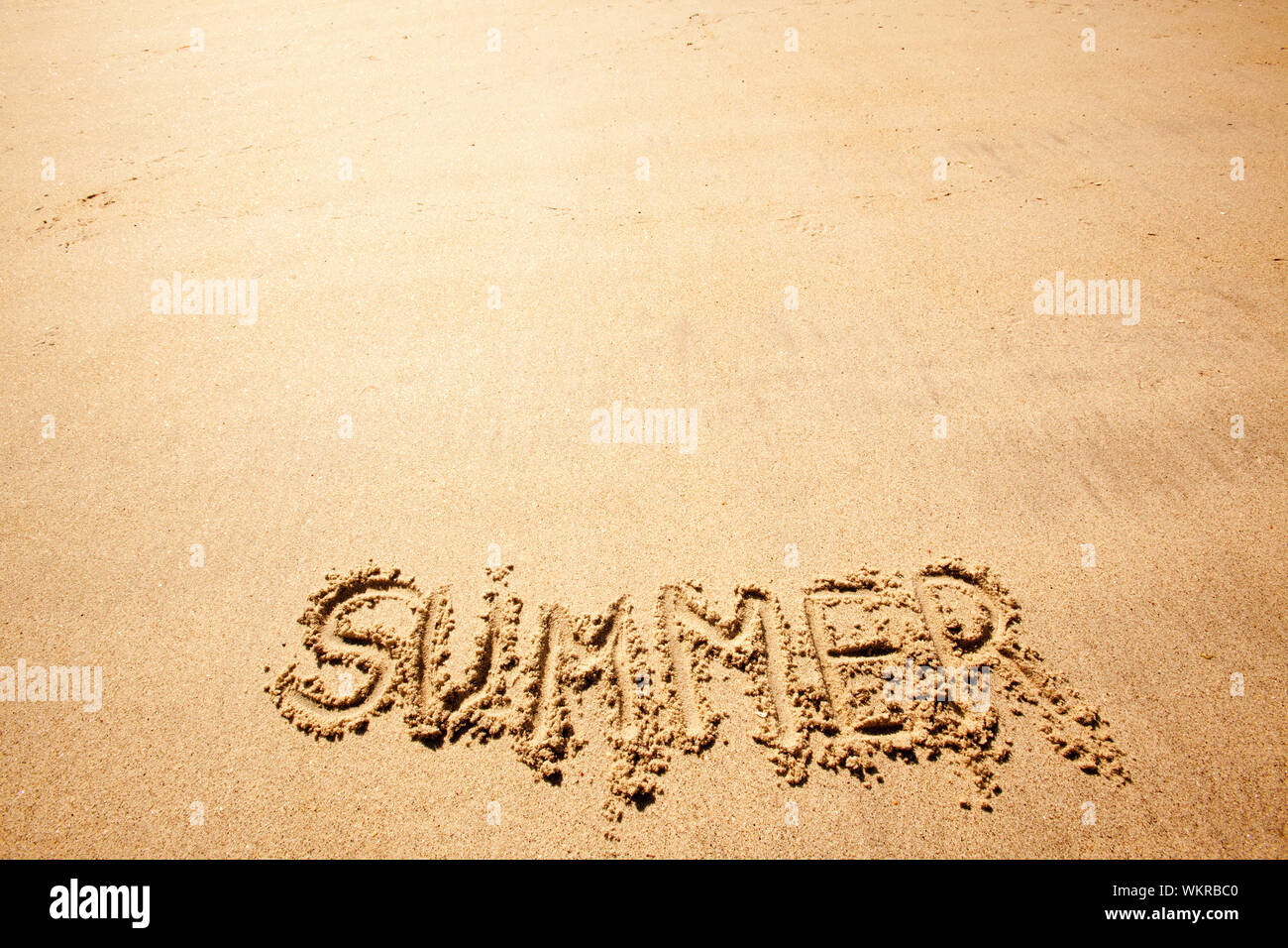 The word summer written in the sand at a beach Stock Photo - Alamy