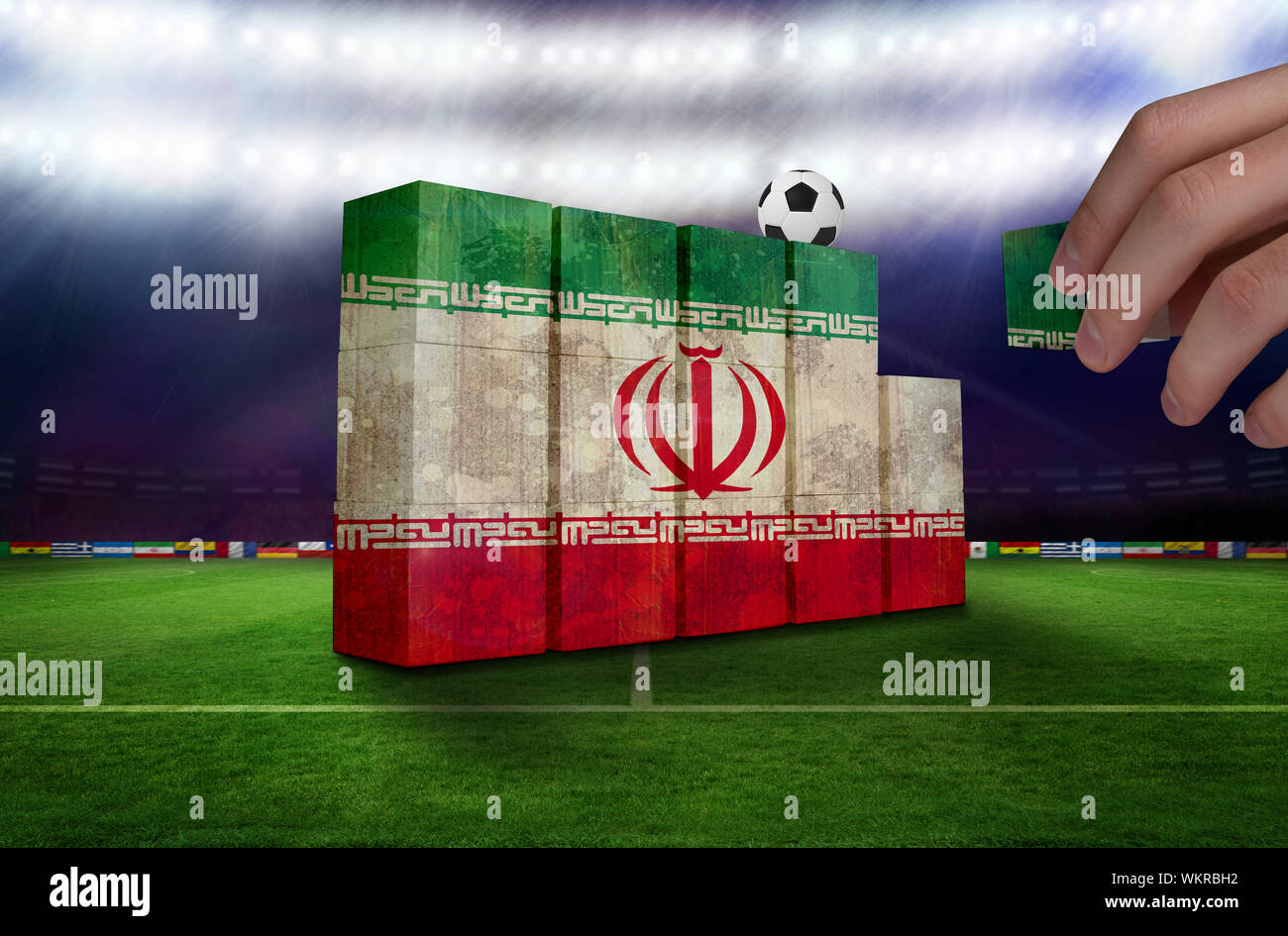 Hand building wall of iran flag in grunge effect Stock Photo - Alamy