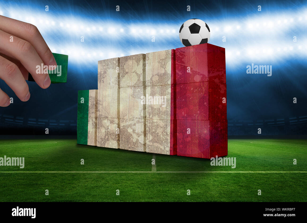 Hand building wall of italy flag in grunge effect Stock Photo - Alamy