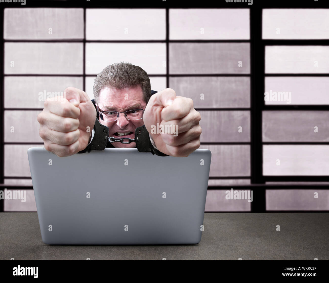 White collar computer criminal in suit wearing handcuffs Stock Photo ...