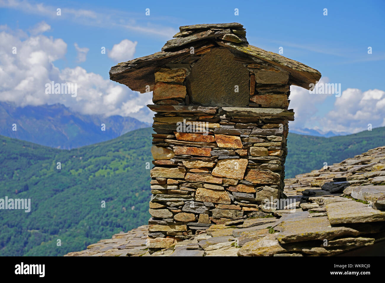 Stone masonry chimney on a house Stock Photo - Alamy