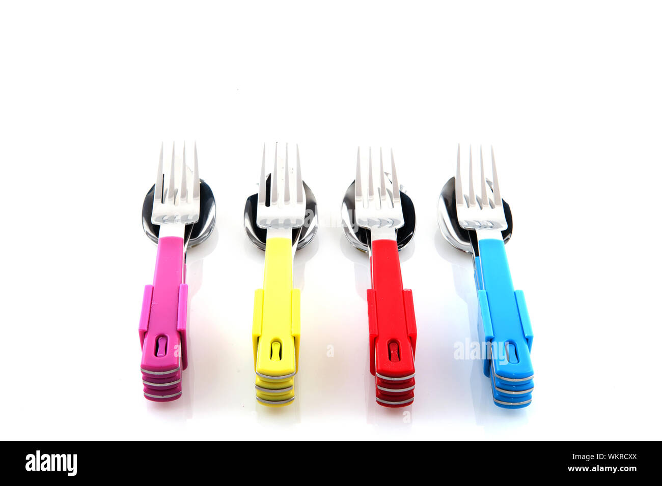 colorful forks knifes and spoons with white background Stock Photo - Alamy
