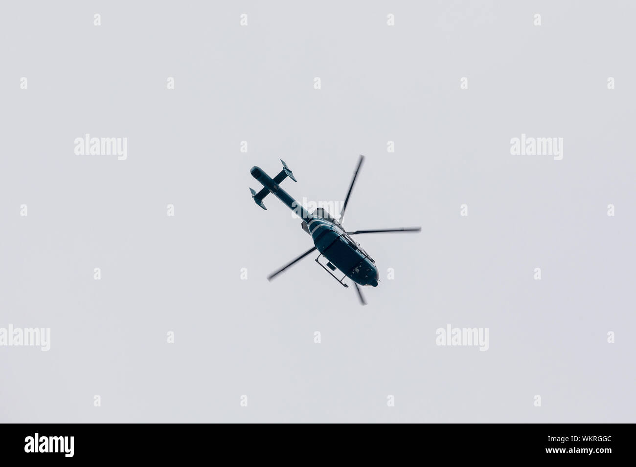 Modern Helicopter Aircraft Flying High in Sky Stock Photo - Alamy