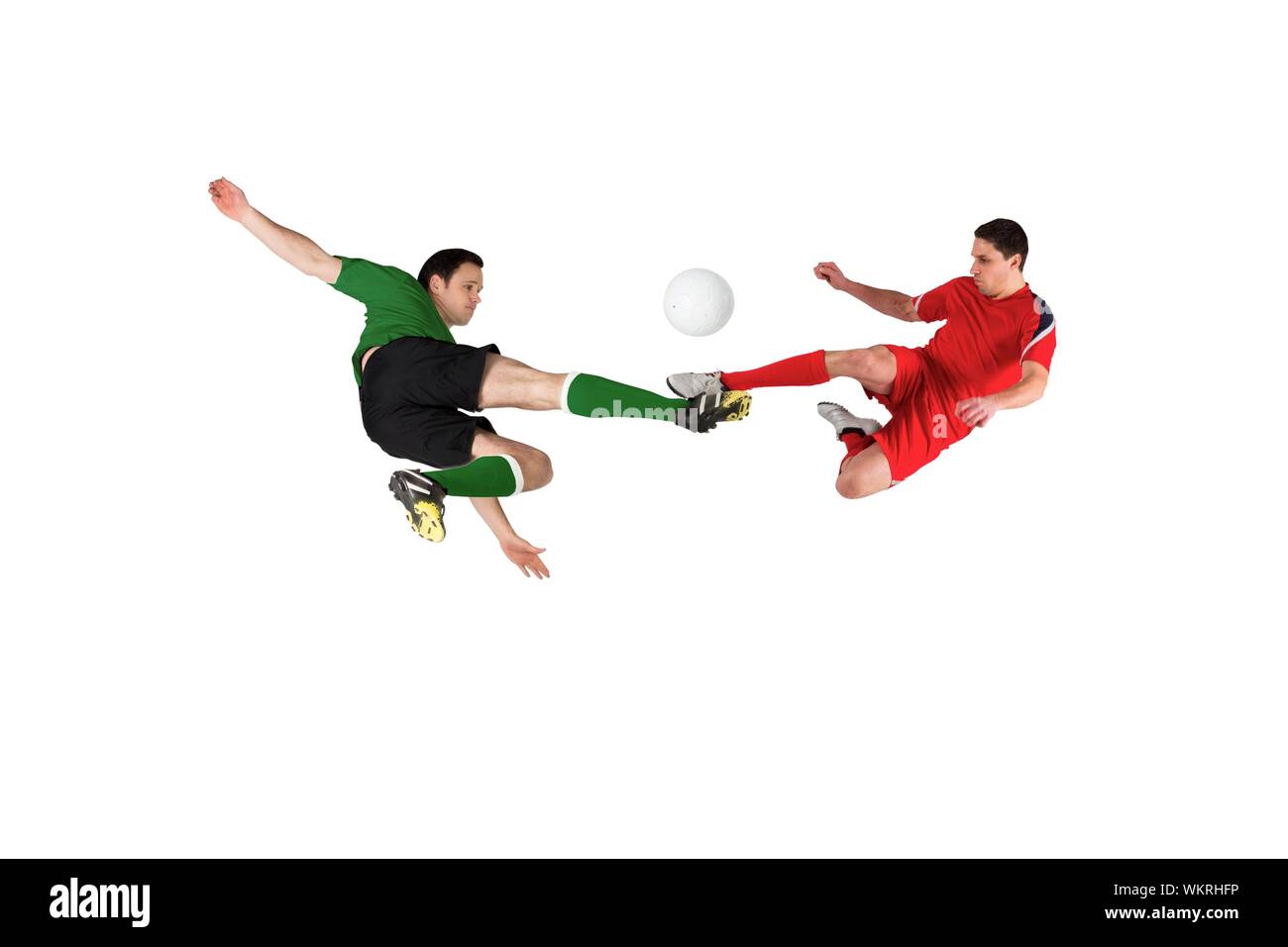 Football players tackling for the ball on white background Stock Photo ...