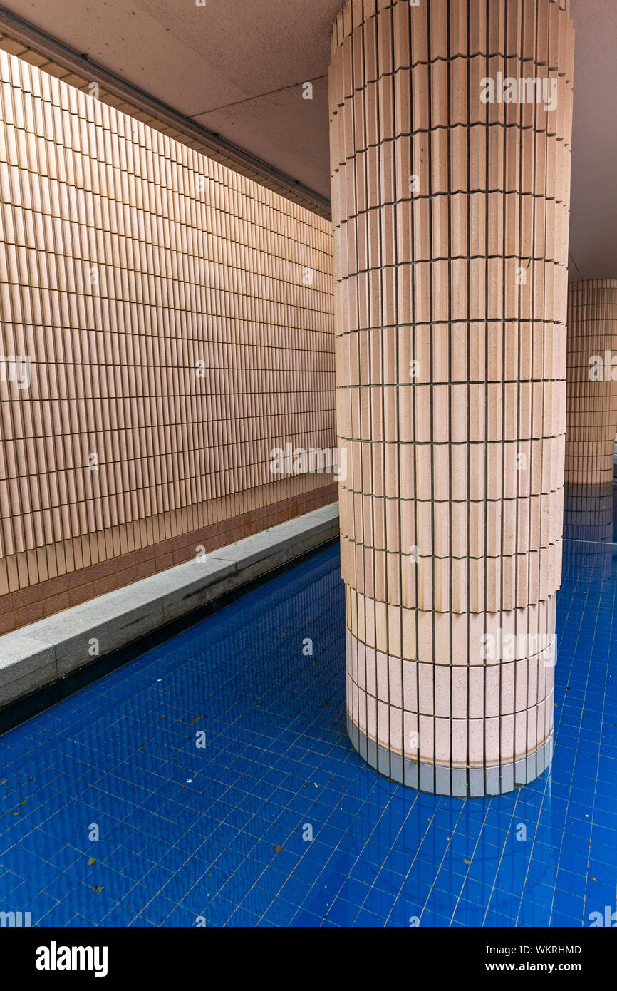 One Big Column in Blue Water Structure Stock Photo - Alamy