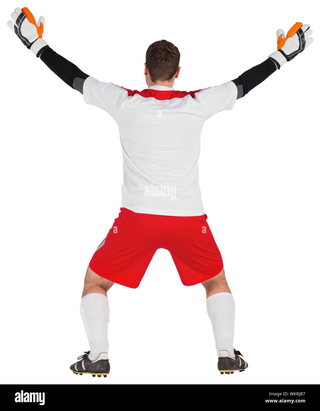 Goalkeeper in white ready to save on white background Stock Photo - Alamy