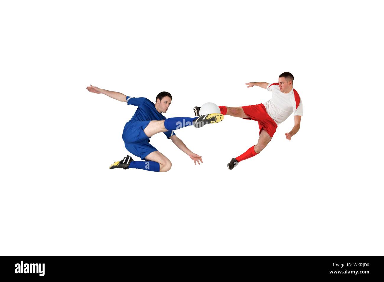 Football players tackling for the ball on white background Stock Photo ...