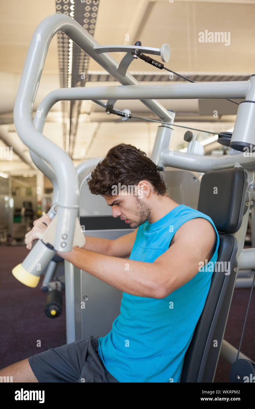 Focused man lifting heavy weights hi-res stock photography and images ...