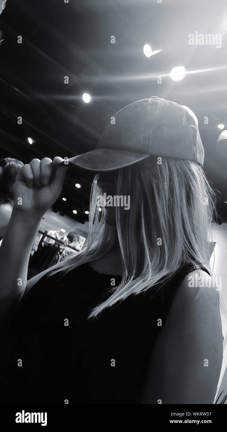 Holding cap hi-res stock photography and images - Alamy