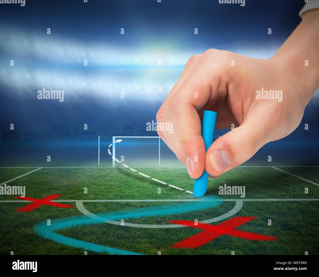 Digital composite of hand drawing tactics on football pitch Stock Photo ...