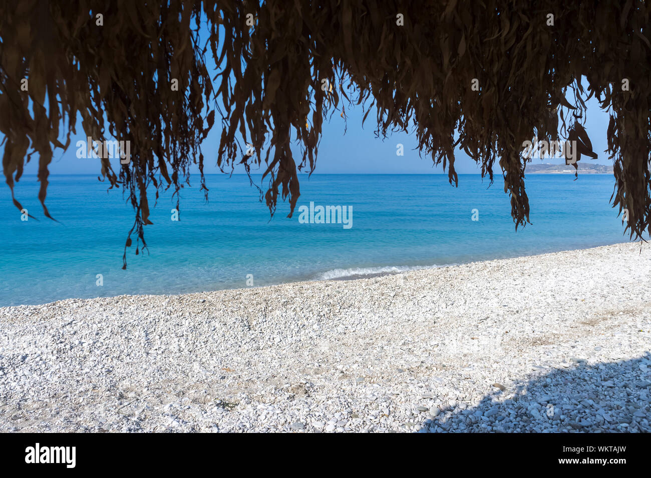 Straw canopy on the beach. Borsh Albania Stock Photo - Alamy